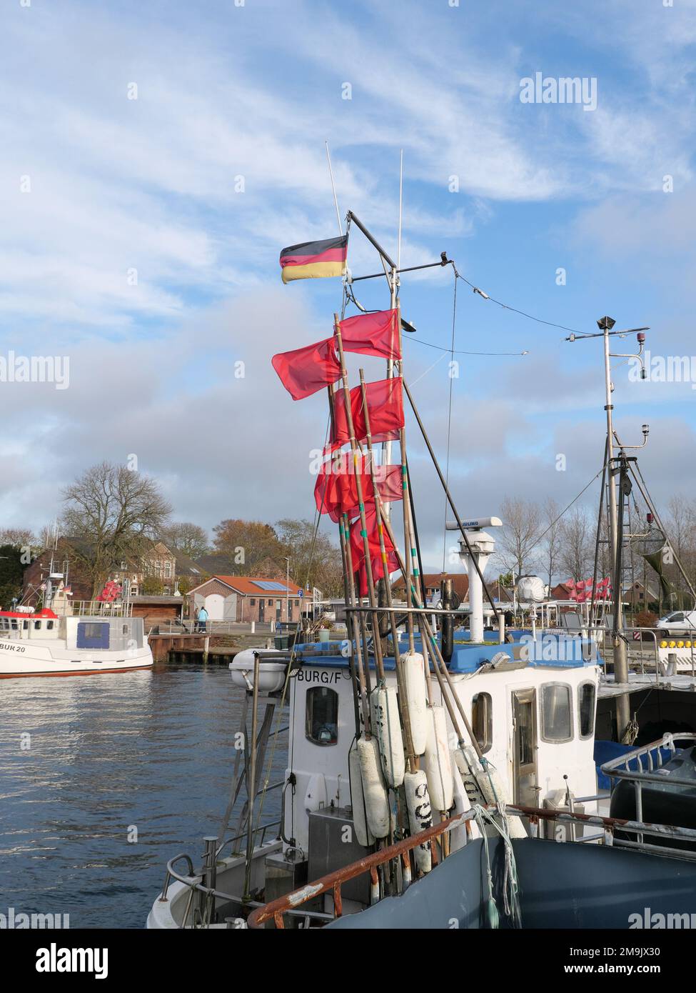 Marking flags for fish trap of a fisherman on a fishing boat in the ...