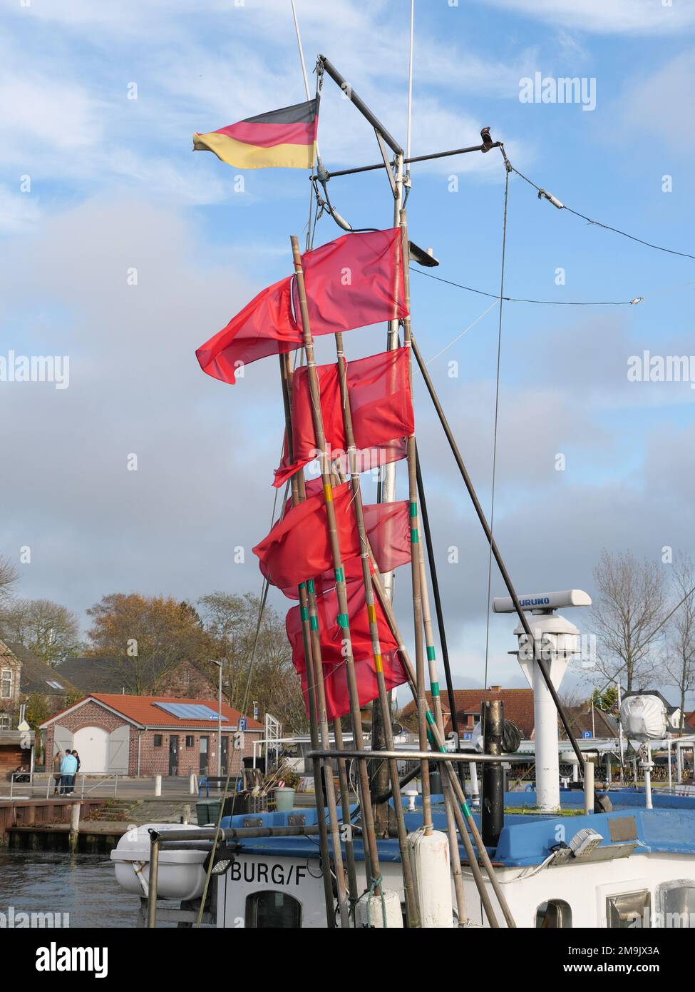 Marking flags for fish trap of a fisherman on a fishing boat in the ...