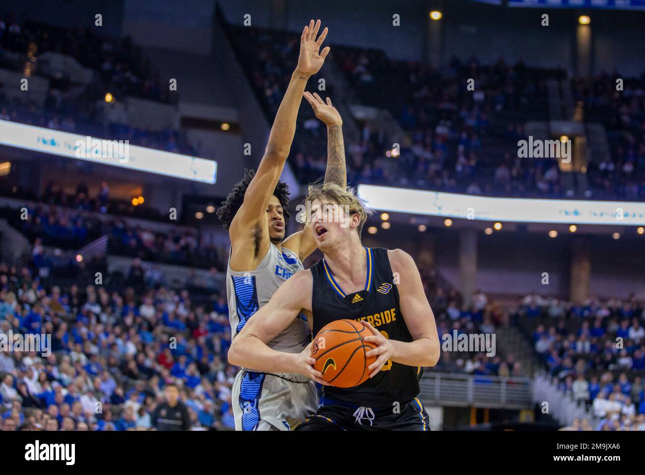 UC Riverside's Lachlan Olbrich (30) drives to the lane against ...