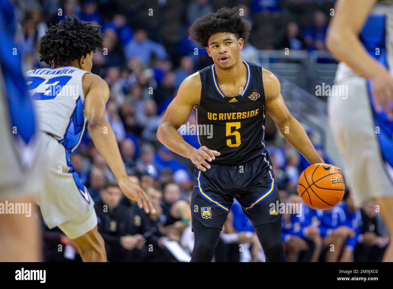 UC Riverside's Zyon Pullin (5) dribbles the ball against Creighton's Trey Alexander (23) during ...