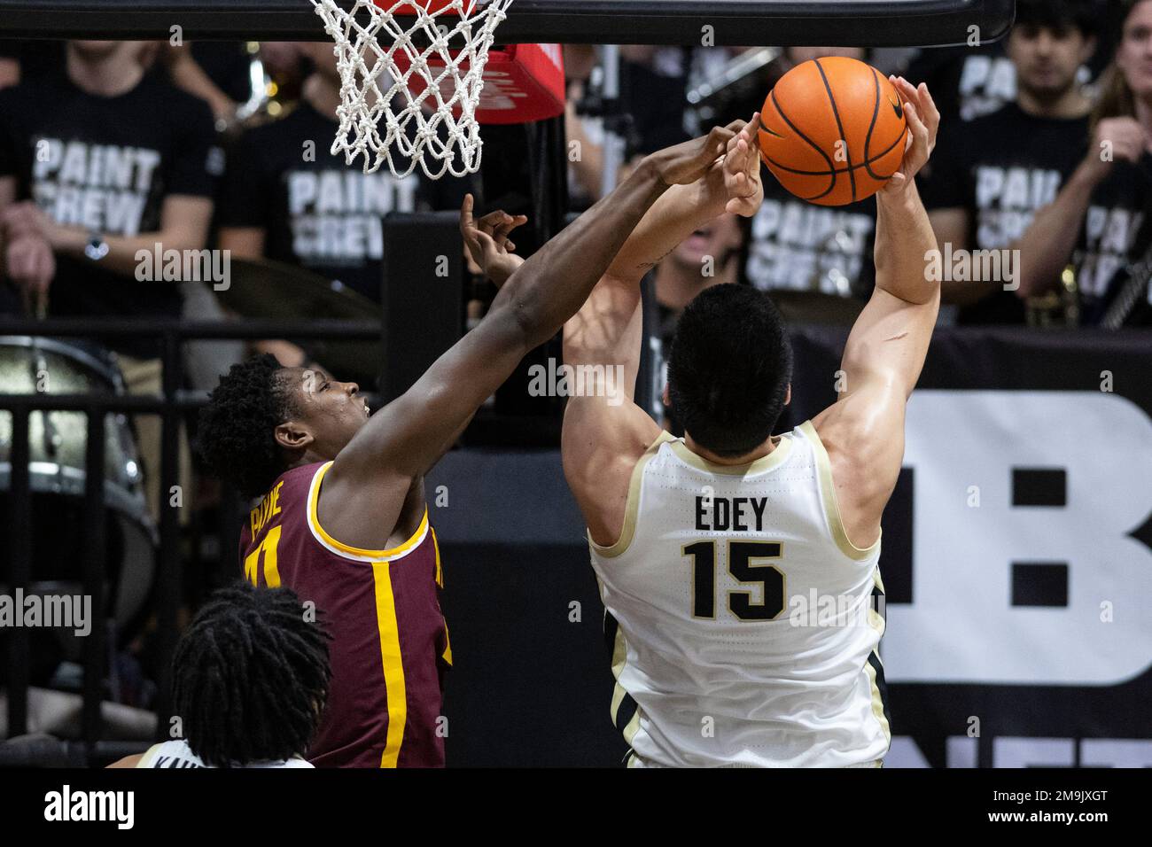 Minnesota forward Pharrel Payne (21) blocks a shot by Purdue center ...