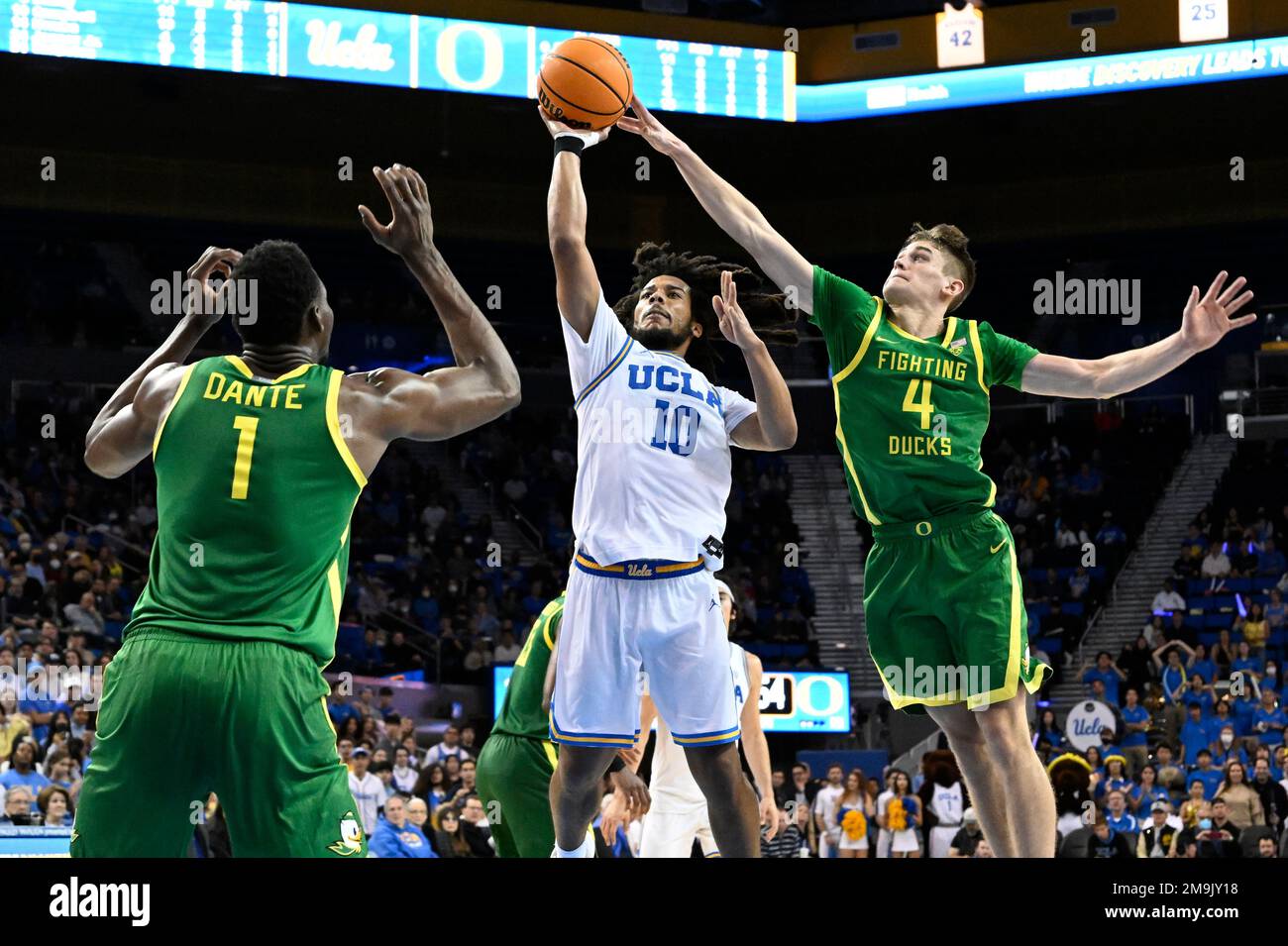 UCLA guard Tyger Campbell (10) has his shot blocked by Oregon guard ...