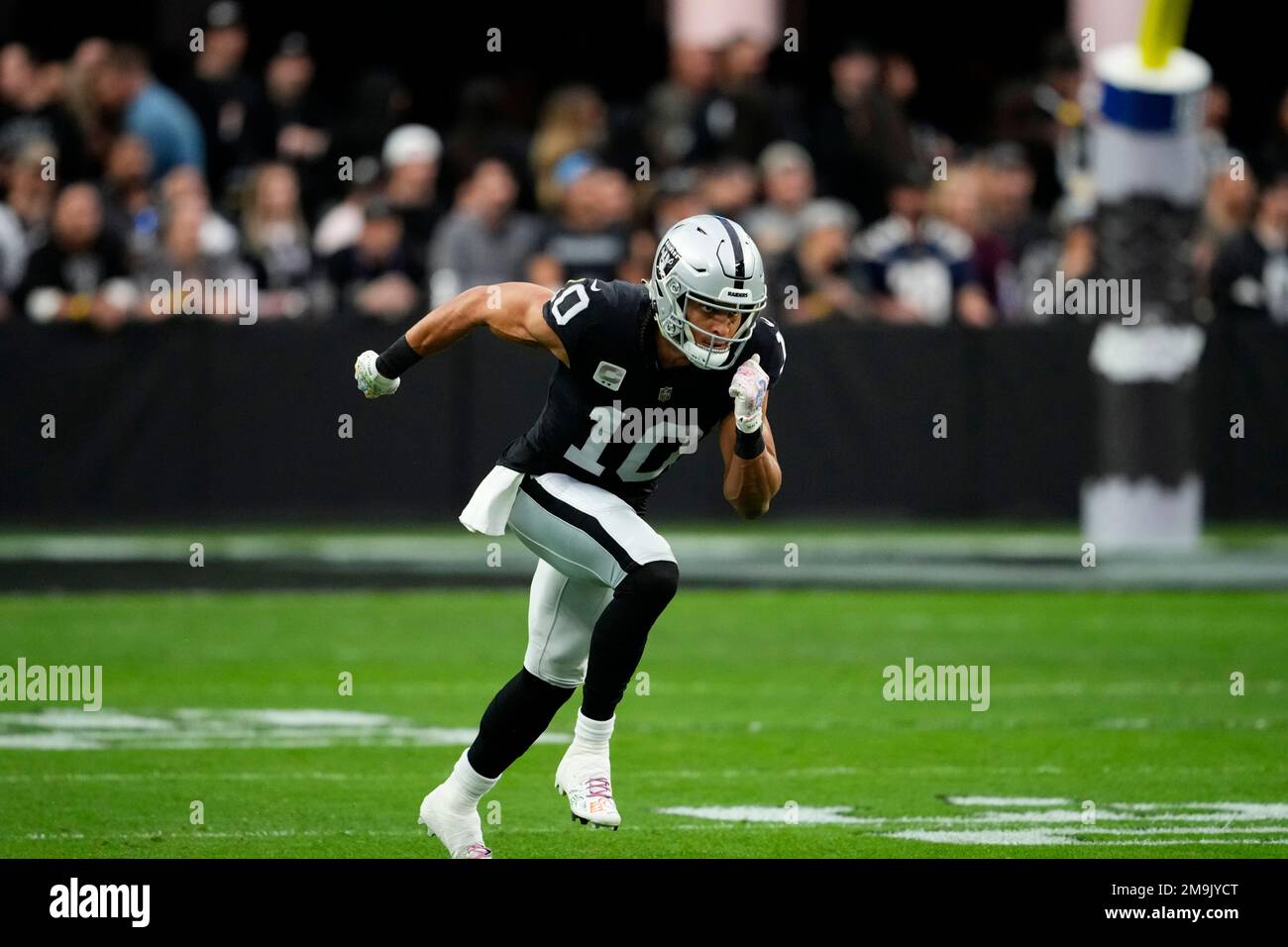 Las Vegas Raiders wide receiver Mack Hollins (10) runs off the line ...