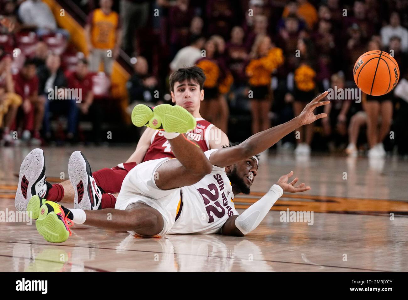 Arizona State forward Warren Washington (22) passes the ball to a ...