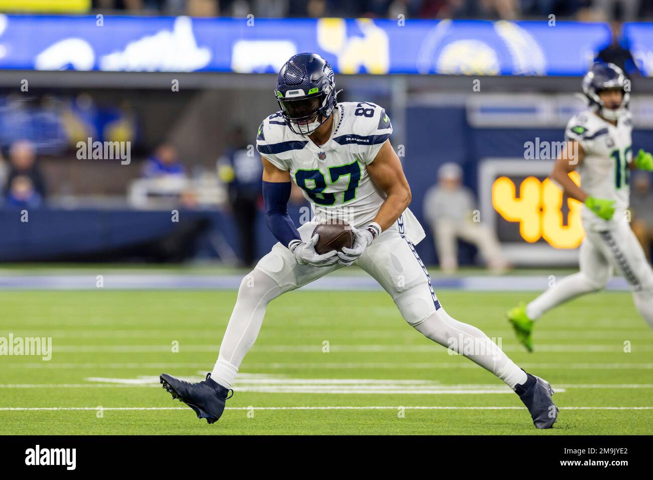 Seattle Seahawks tight end Noah Fant (87) catches a pass and runs against the Los Angeles Rams ...
