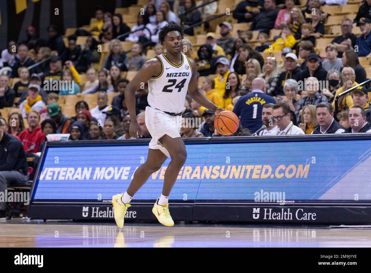 Missouri's Kobe Brown brings the ball up court during the second half of an NCAA college ...