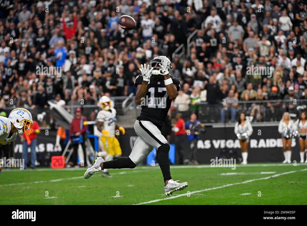 Las Vegas Raiders wide receiver Davante Adams (17) pulls in a touchdown ...