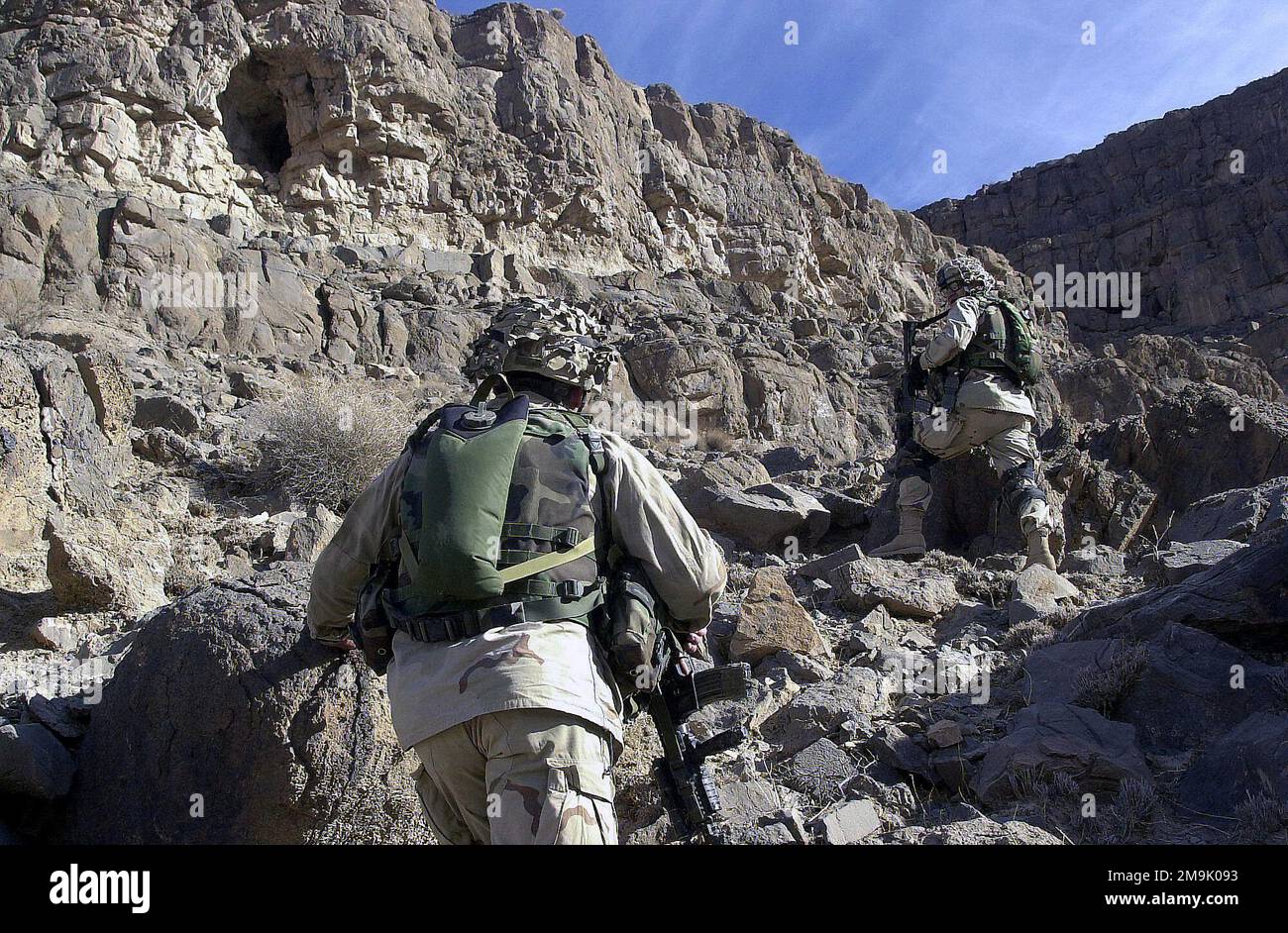 Equipped with a hydration system, interceptor body armor and armed with ...