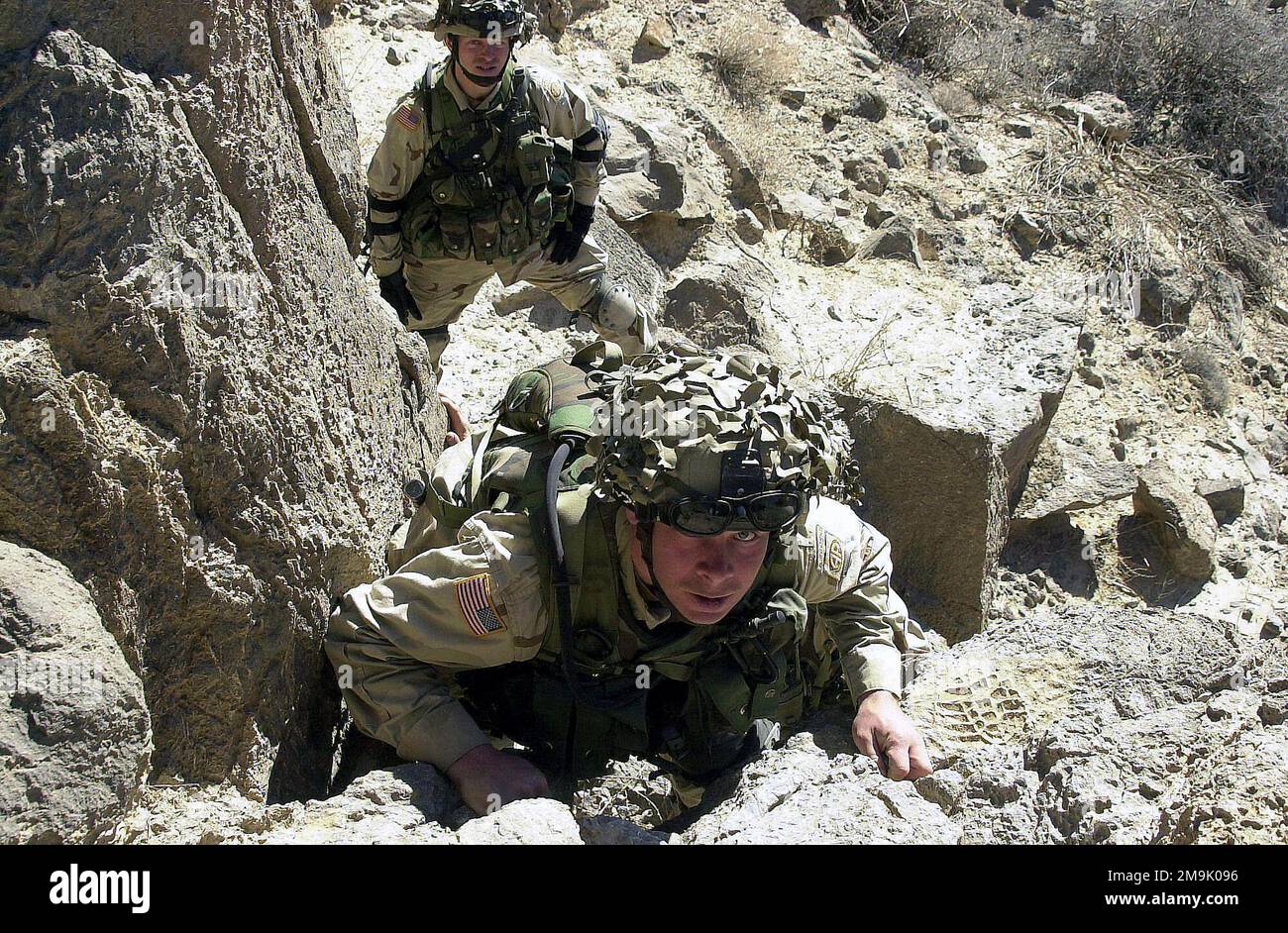 Armed with 5.56mm M4 Carbines, US Army (USA) Private First Class (PFC ...