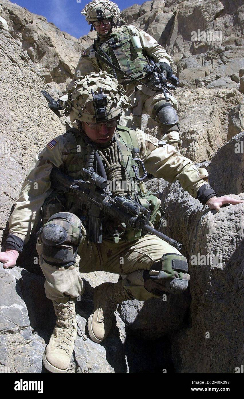Armed with 5.56mm M4 Carbines, two soldiers with "A" Company, 2nd ...
