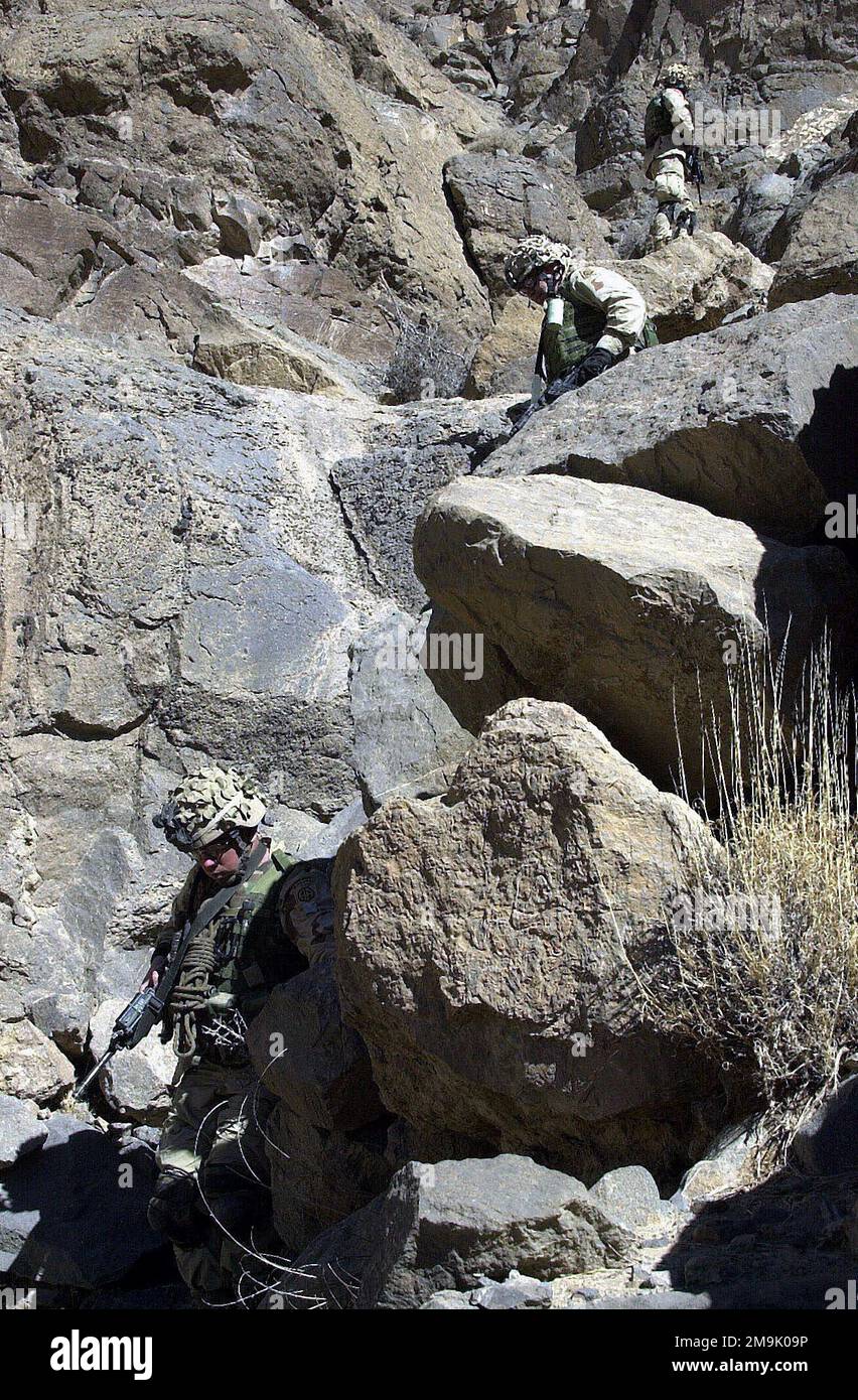 Armed with 5.56mm M4 Carbines, soldiers with "A" Company, 2nd Battalion ...