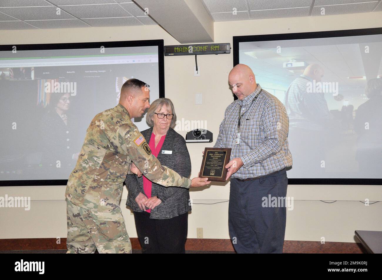 FORT CARSON, Colo. — Col. Nate Springer, left, garrison commander ...