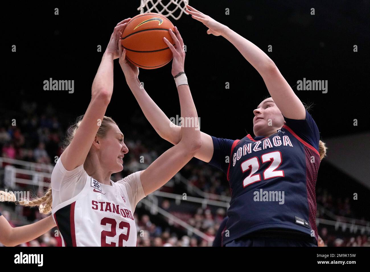 Stanford forward Cameron Brink, left, battles for a rebound against ...