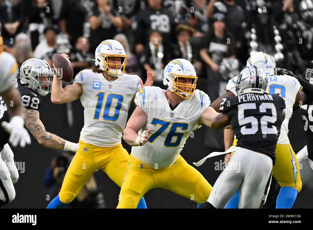 Los Angeles Chargers quarterback Justin Herbert (10) passes under ...