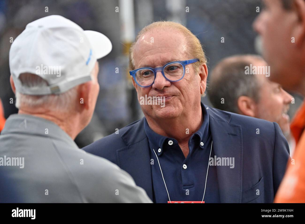 Dean Spanos, owner of the Los Angeles Chargers, talks on the field ...