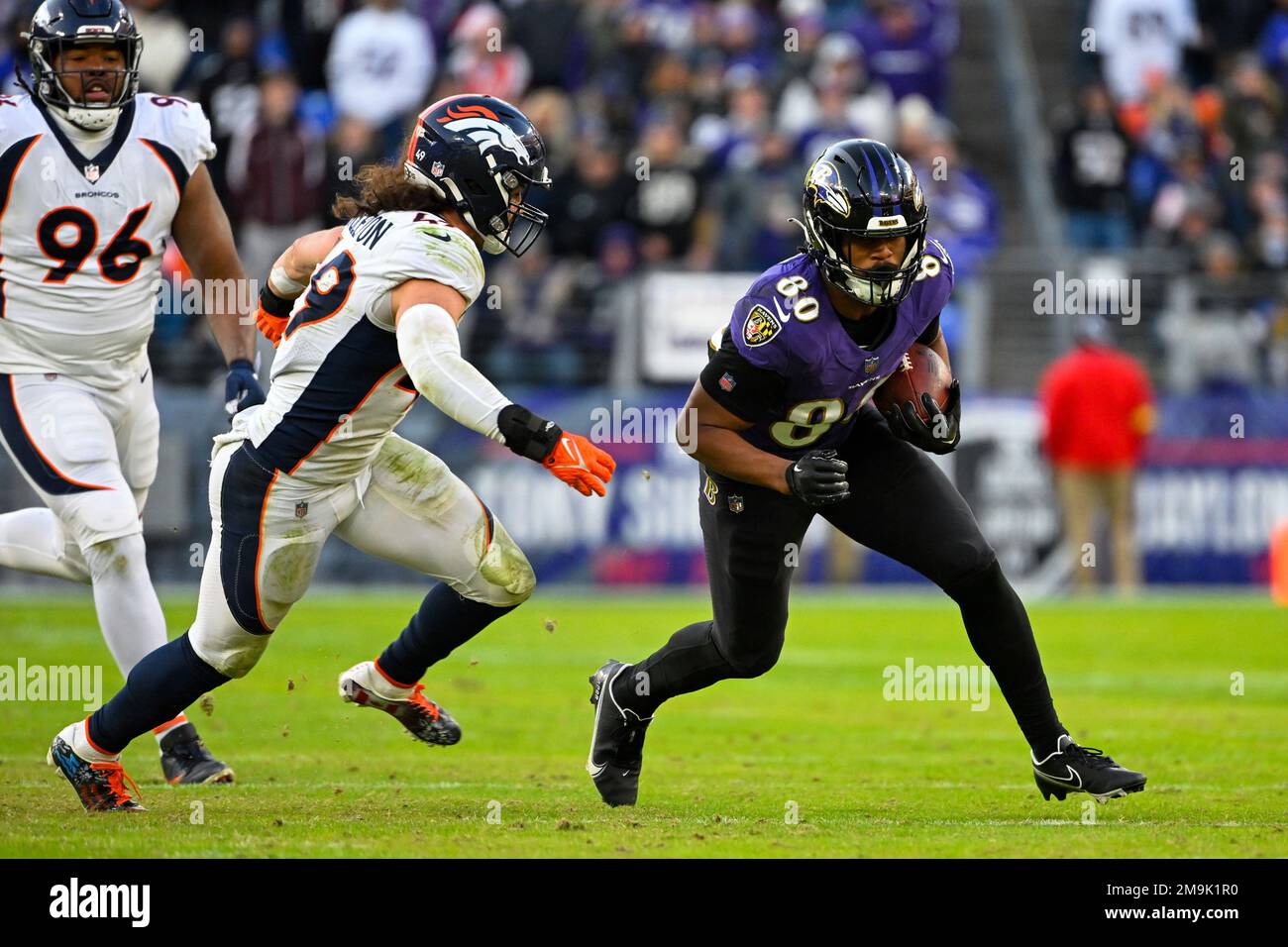 Baltimore Ravens tight end Isaiah Likely (80) runs with the ball after ...