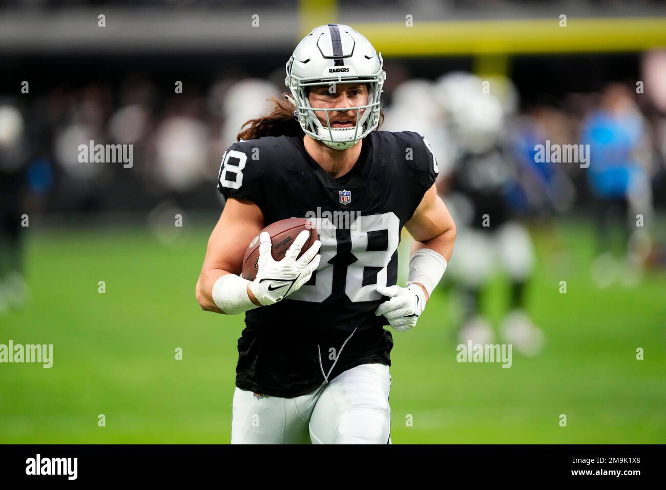 Las Vegas Raiders tight end Jacob Hollister (88) warms up before an NFL ...