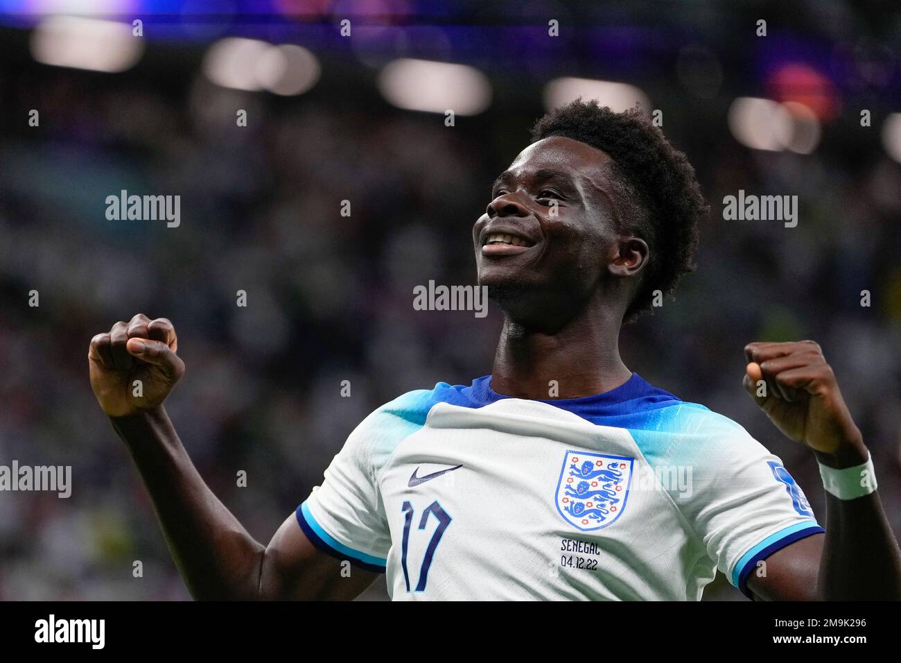 England's Bukayo Saka celebrates after scoring his side's third goal ...