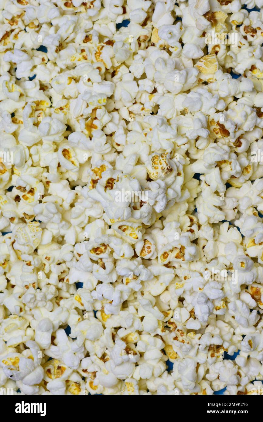 A Popcorn background, typical for moments of entertainment Stock Photo ...