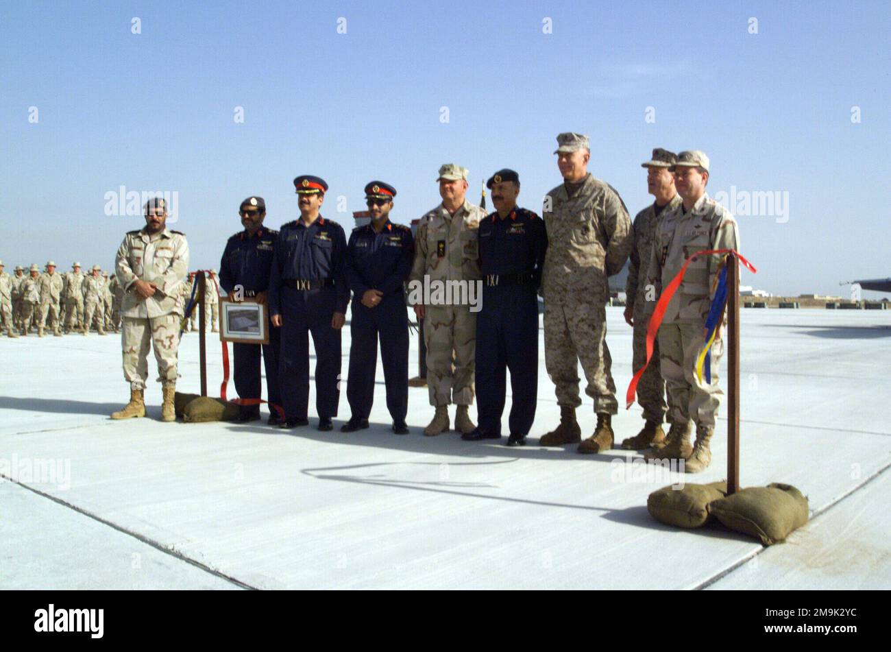 US Military and State of Kuwait Officials pose for a group photograph ...