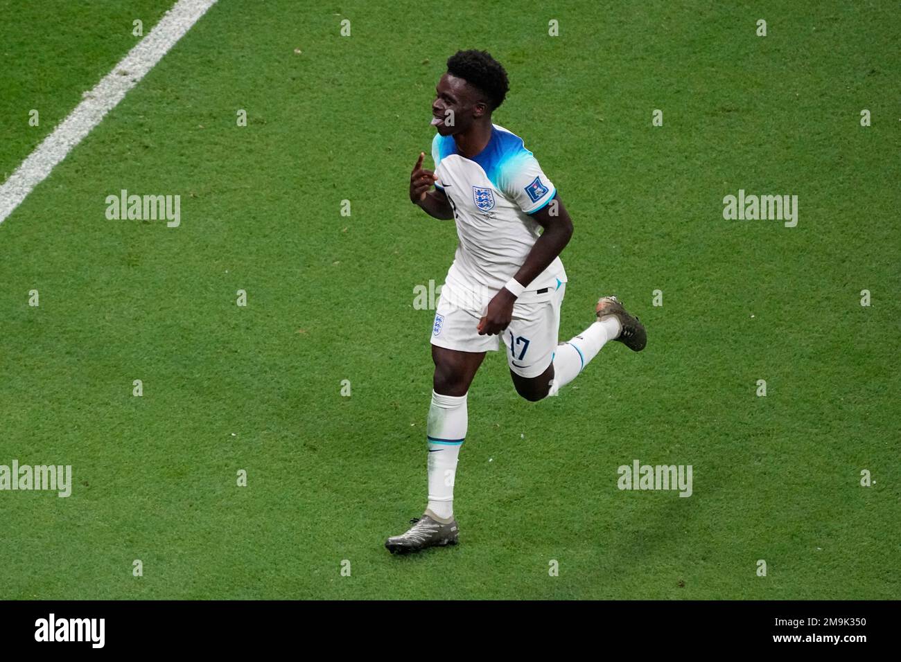 England's Bukayo Saka celebrates after scoring his side's 3rd ...