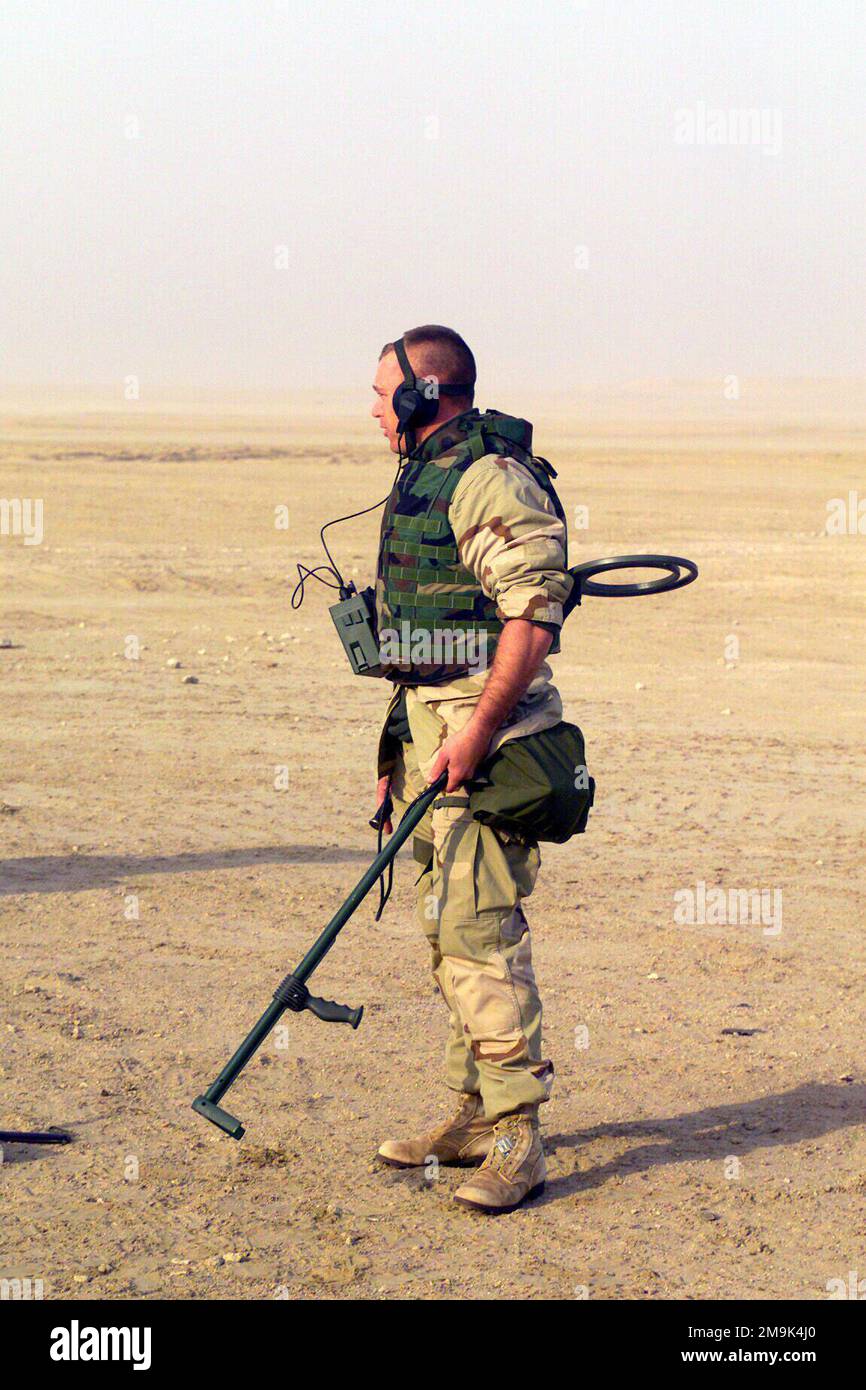 GUNNERY Sergeant (GYSGT) Keith Mrozinski demonstrates the proper use of ...