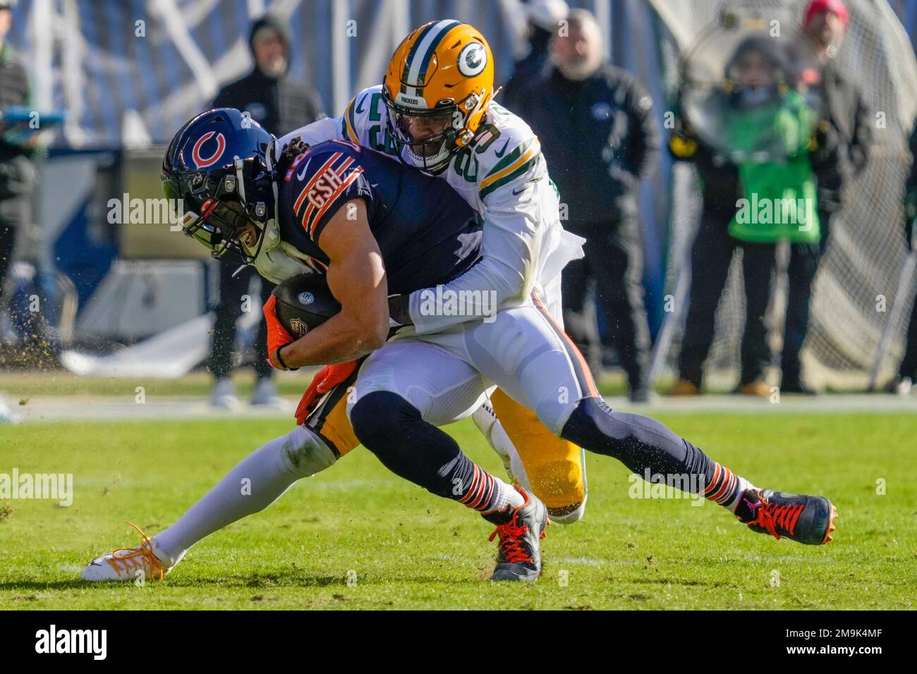 Chicago Bears' Chase Claypool fumbles as he is hit by Green Bay Packers ...