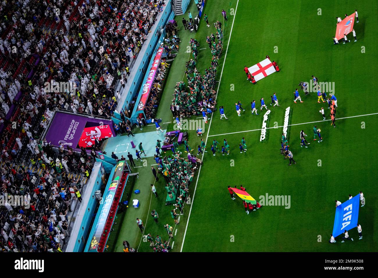 Players of Senegal, left, and England , right, enter the pitch prior ...