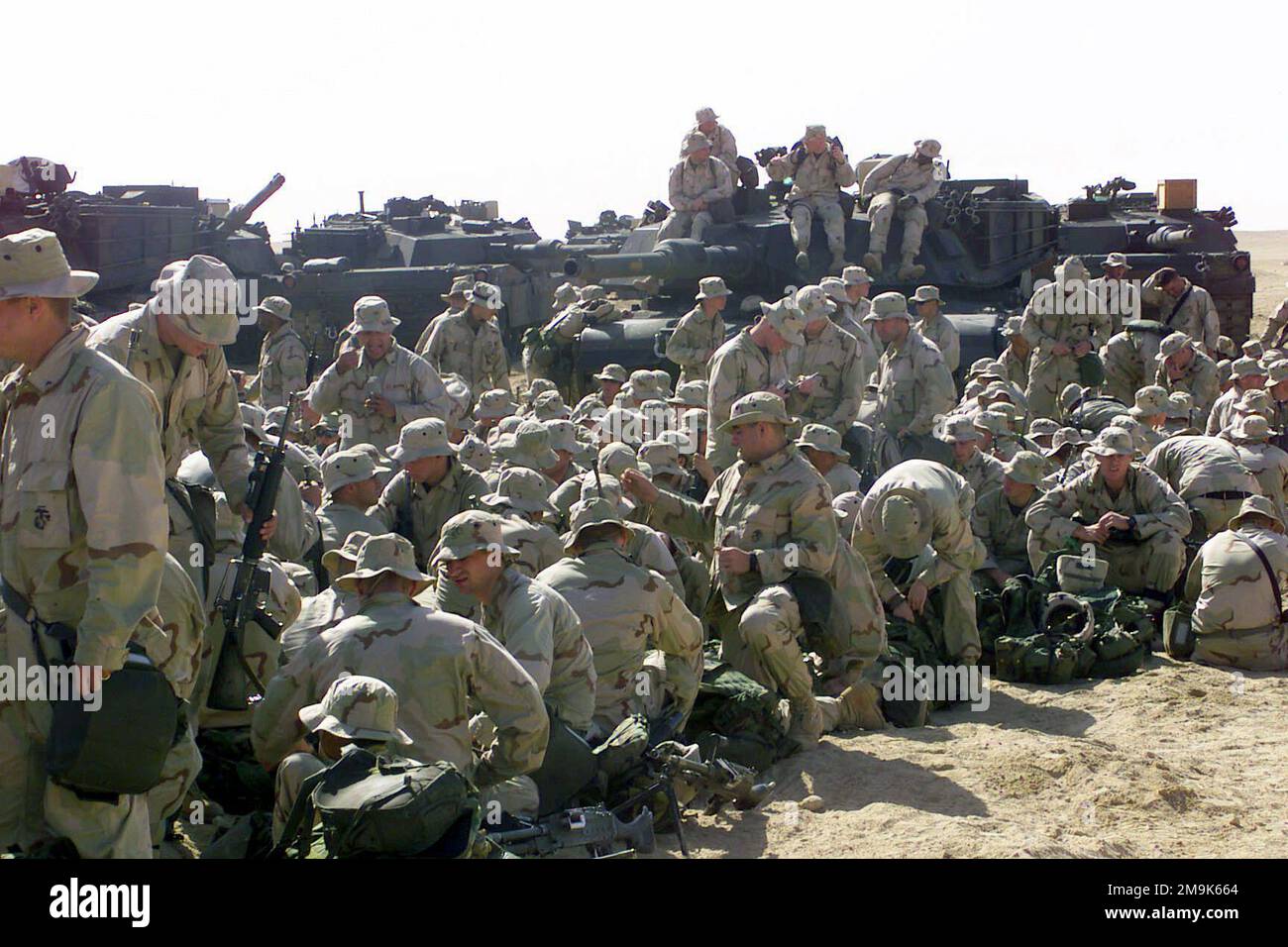 US Marines from Task Force Five gather at Camp Coyote, a Forward Area ...