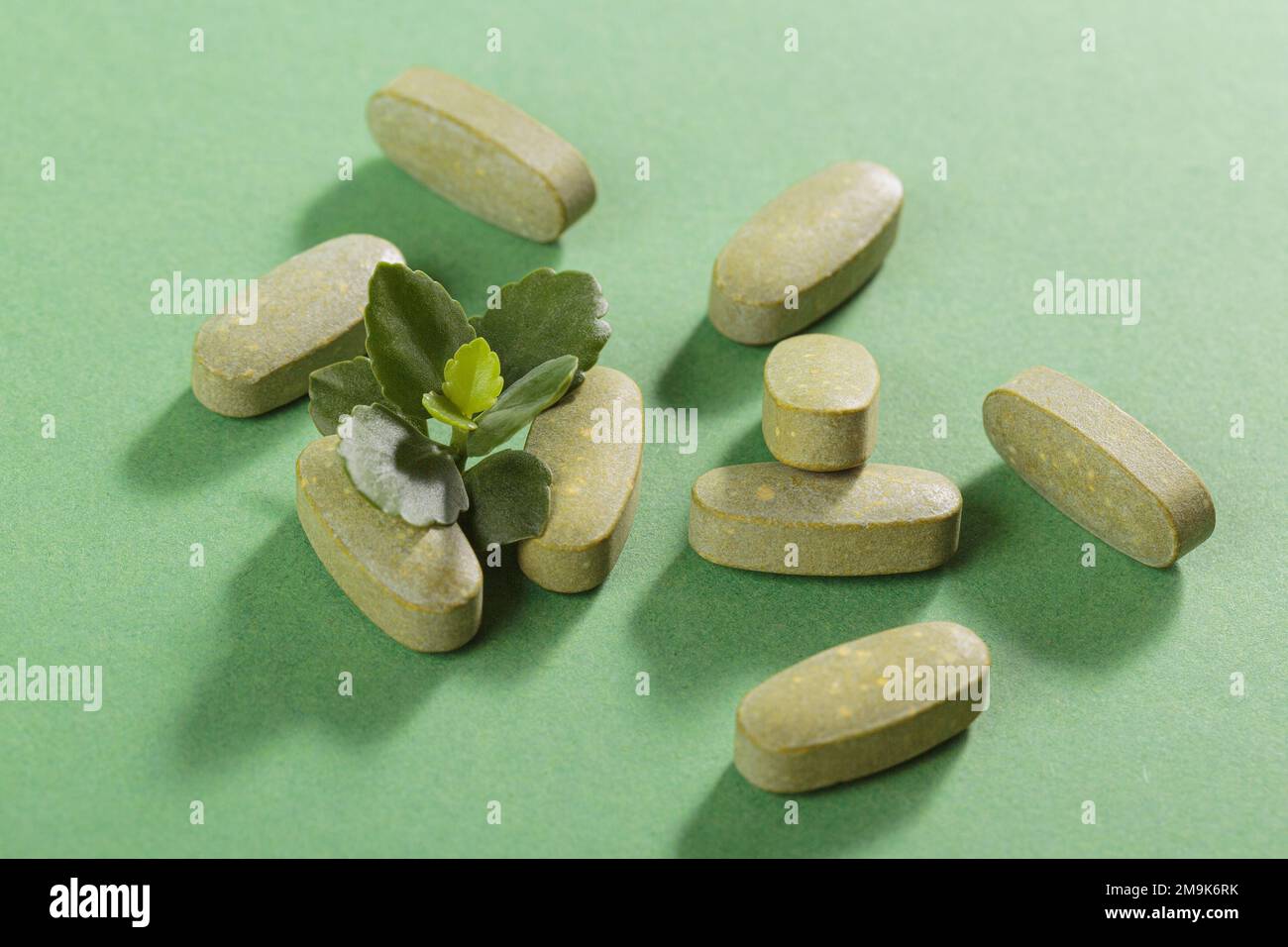 Green vitamin supplement tablet hi-res stock photography and images - Alamy