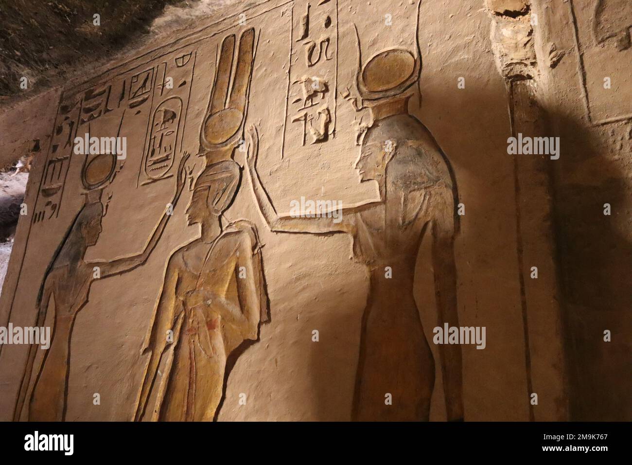 Egyptian goddesses Isis in a crowning ceremony Stock Photo - Alamy
