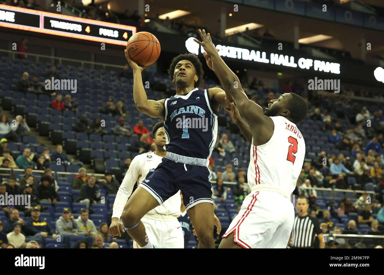 Maine Black Bears' Kellen Tynes (1) goes for the basket as Marist Red ...