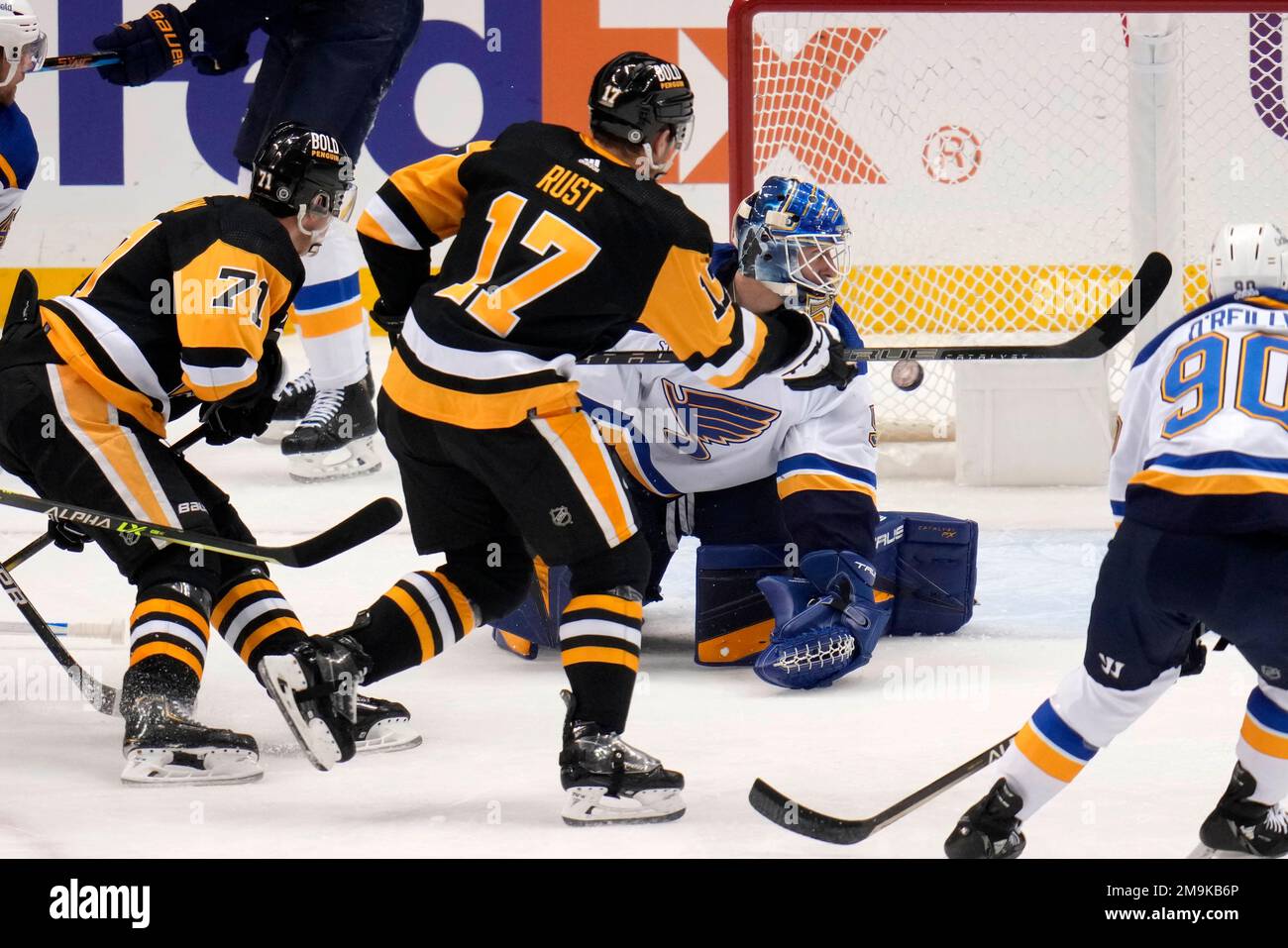 Pittsburgh Penguins' Bryan Rust (17) scores past St. Louis Blues ...