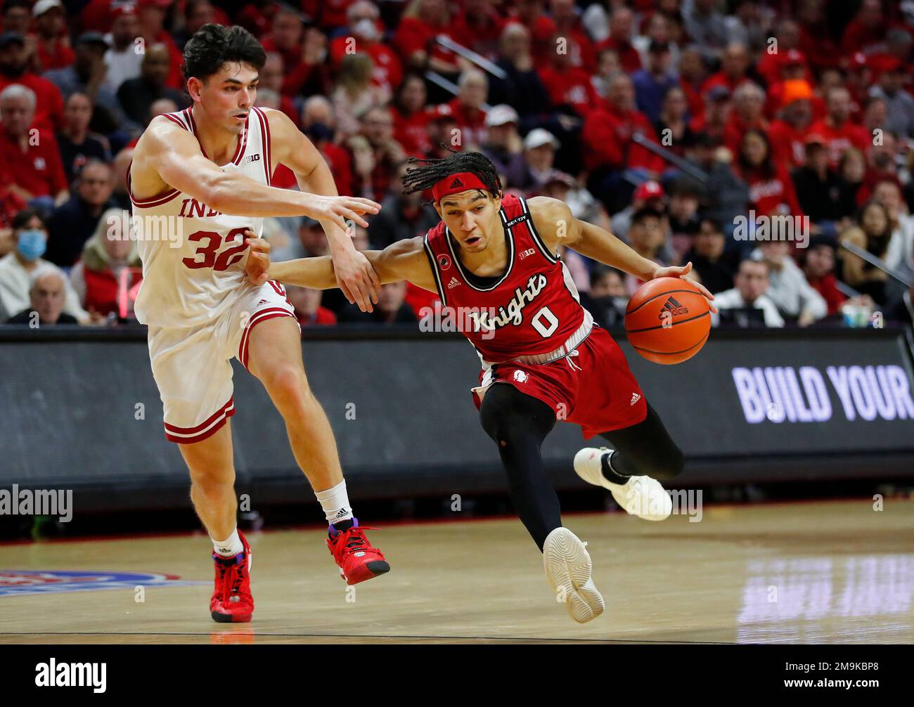 Rutgers guard Derek Simpson (0) drives to the basket against Indiana ...