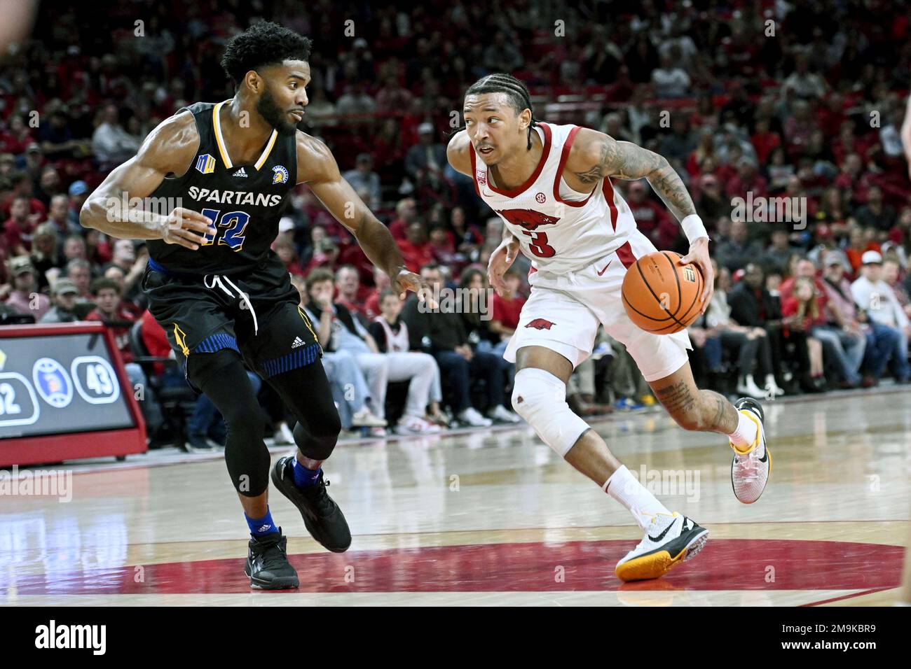 Arkansas guard Nick Smith Jr. (3) tries to get past San Jose State ...