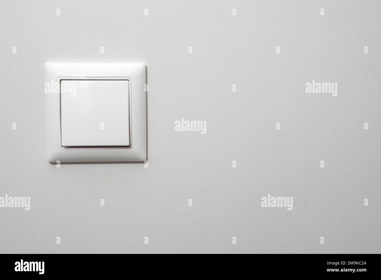 White light switch, a plastic mechanical switch of white color ...