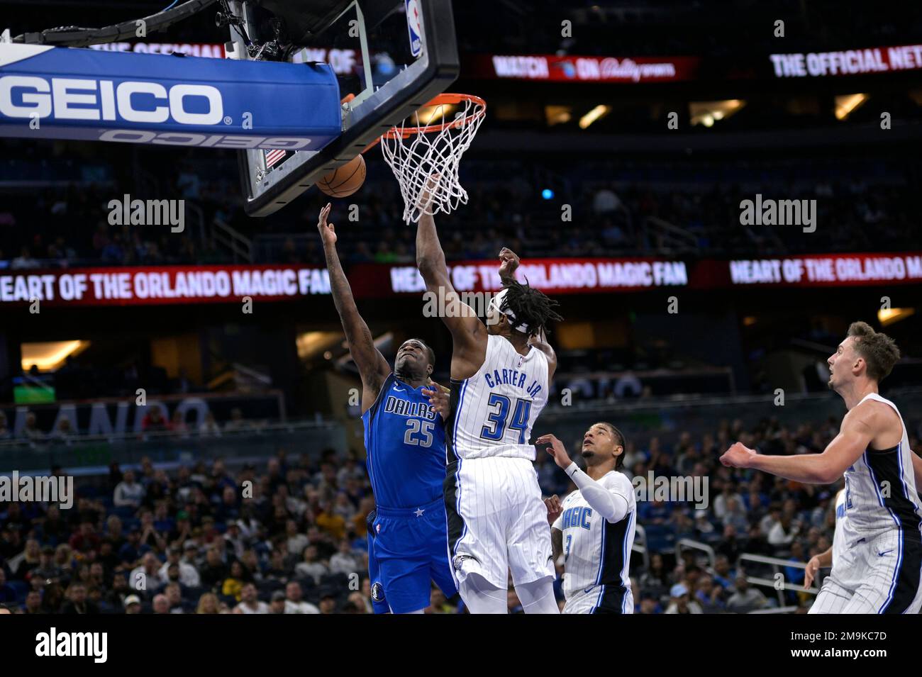 Dallas Mavericks forward Reggie Bullock (25) shoots as Orlando Magic ...
