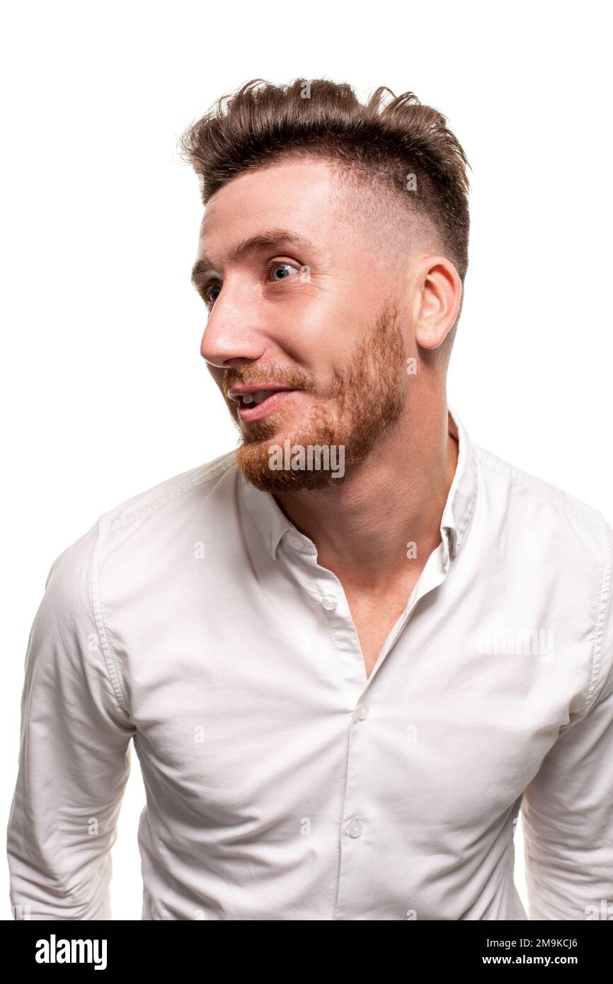 Studio photo of a good-looking man in a white shirt, isolated over a ...