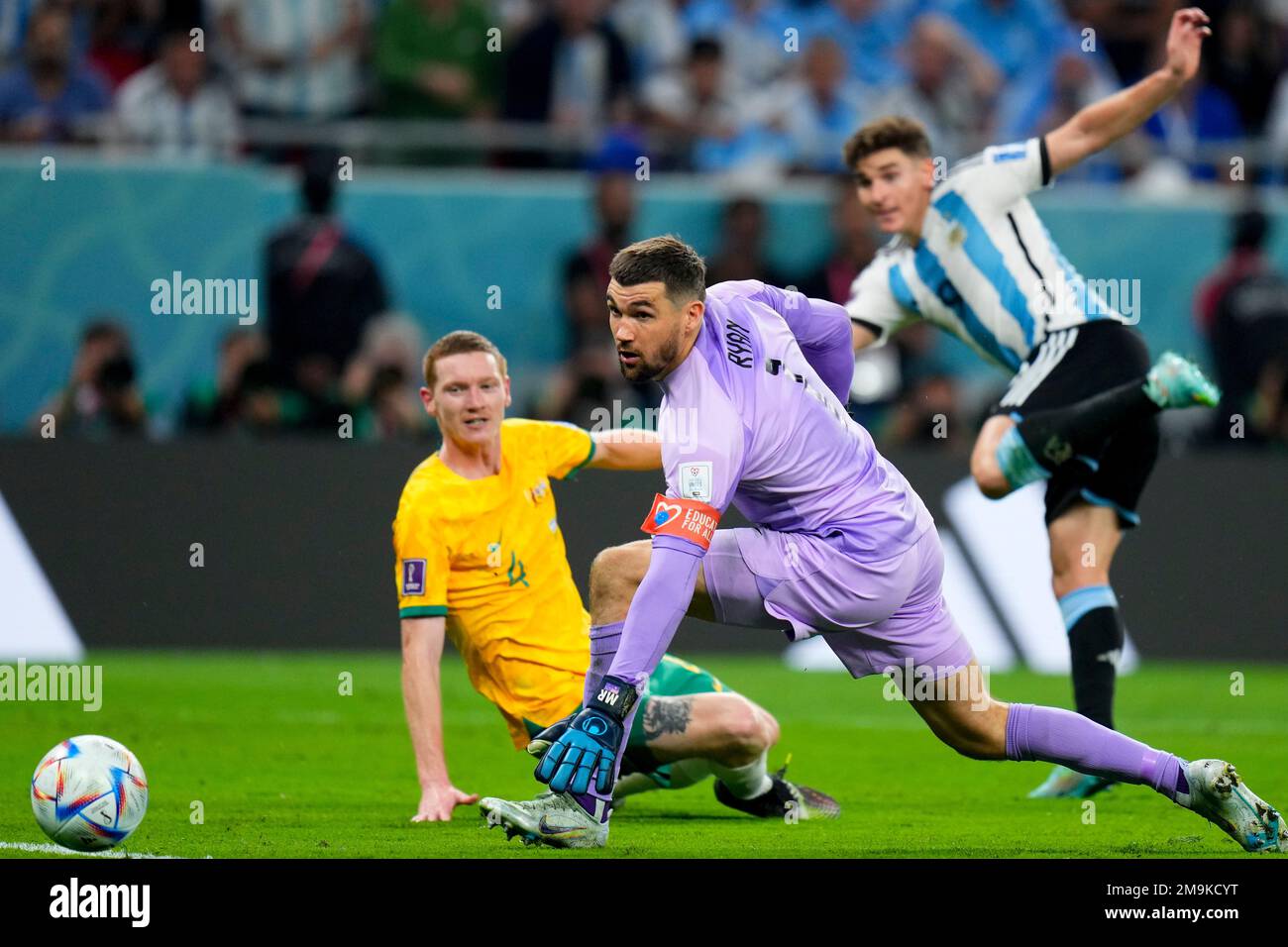 Australia's goalkeeper Mathew Ryan, center, fails to stop Argentina's ...