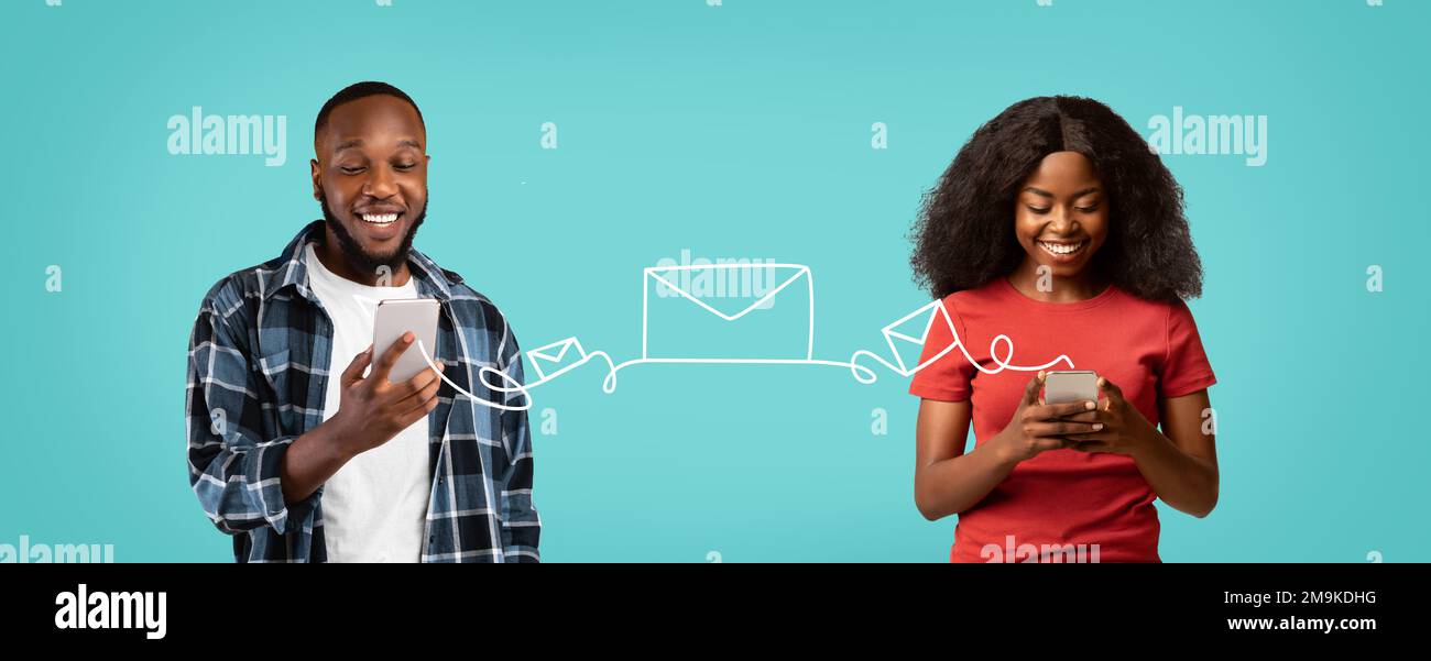 Black young couple sending messages to each other via smartphones Stock ...