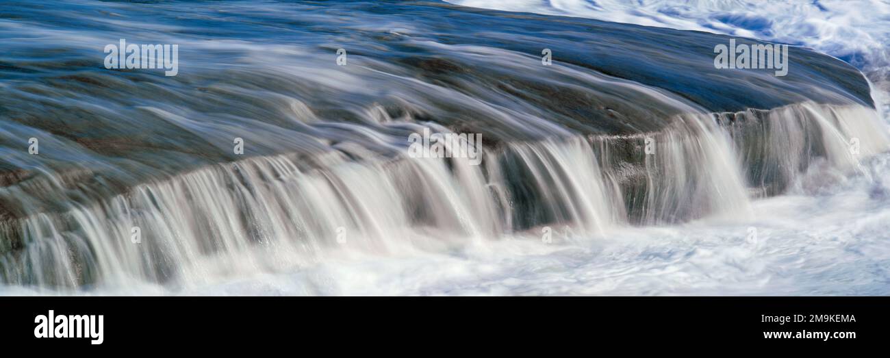 Surf cascading over boulder, Pacific Ocean, Windansea Beach, La Jolla ...