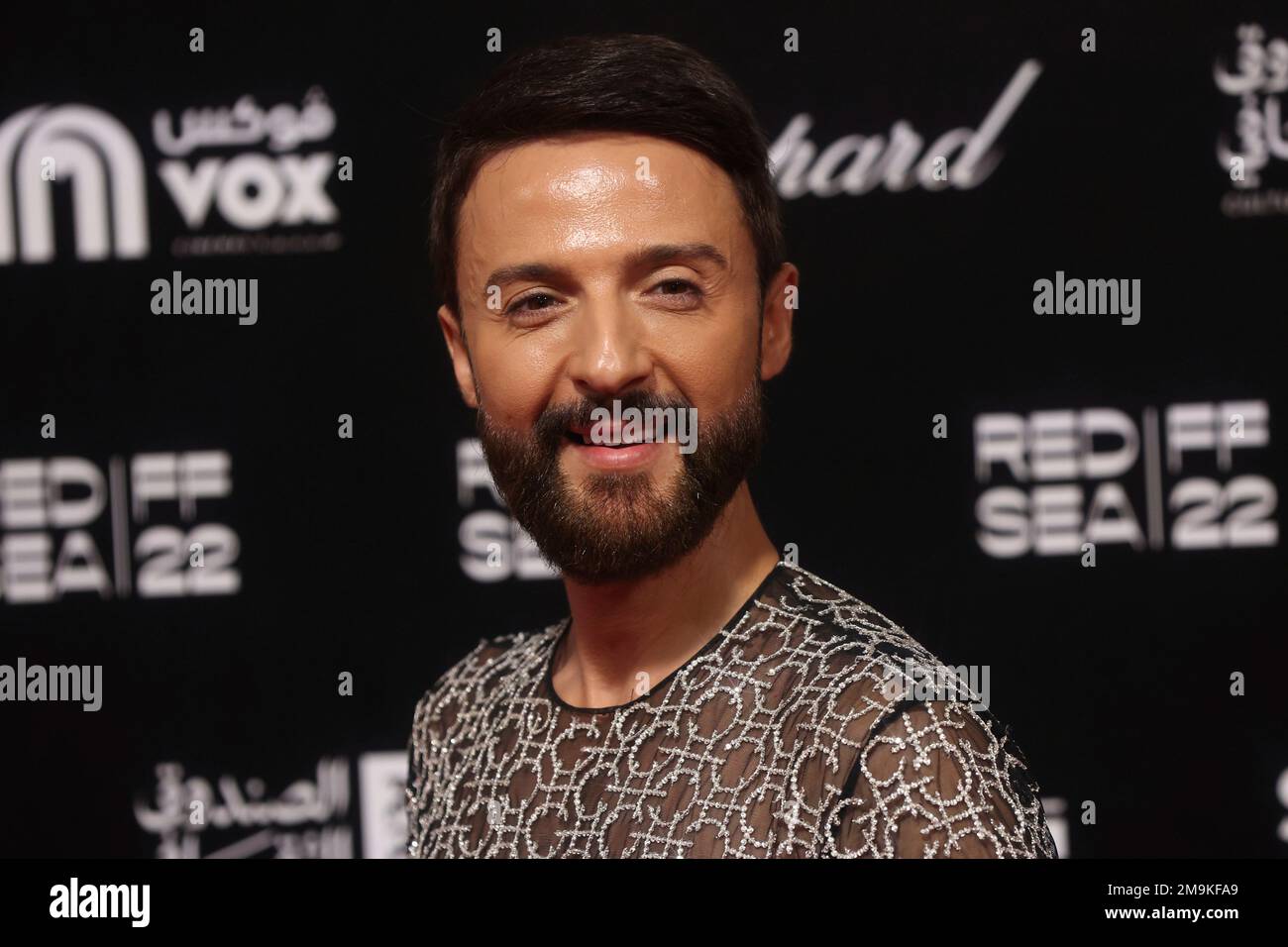 Chadi Haddadposes for photographers upon arrival for the film 'All ...