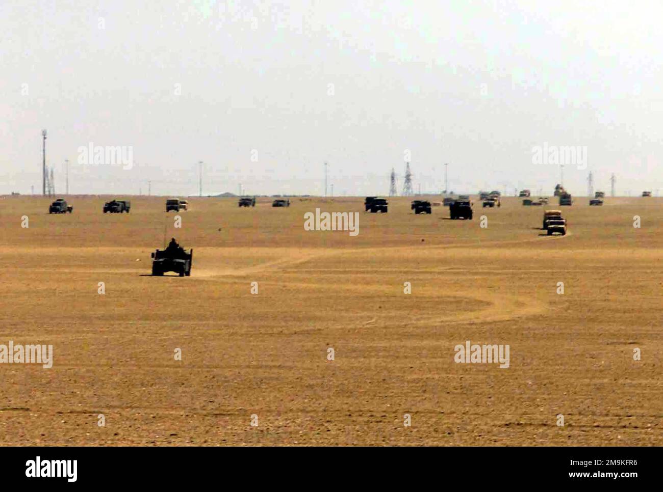 US Marine Corps (USMC) convoy on the horizon during the Regimental Main ...