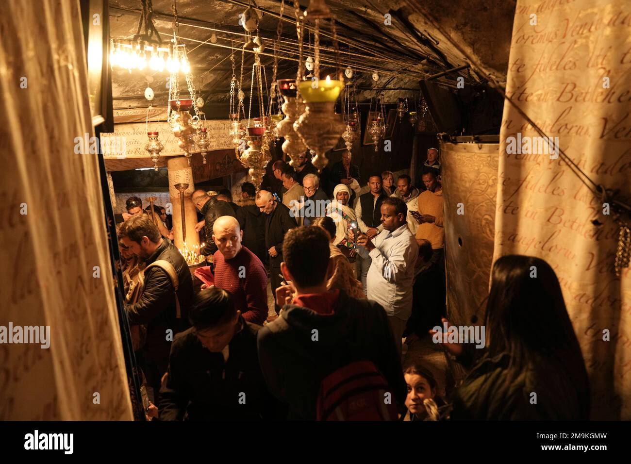 Worshippers visit the Church of the Nativity, traditionally believed to ...