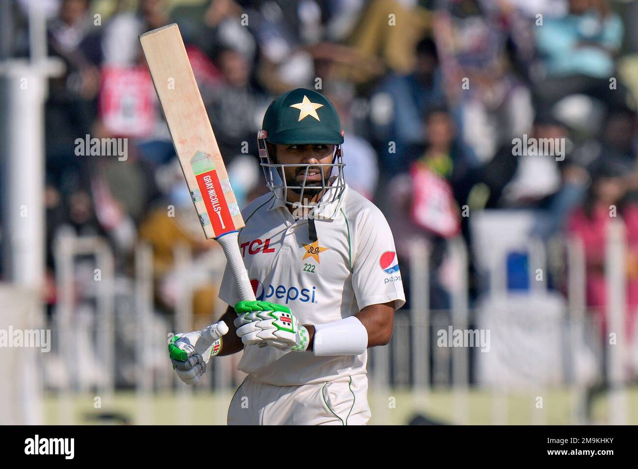 Pakistan's Babar Azam celebrates after scoring fifty during the third ...