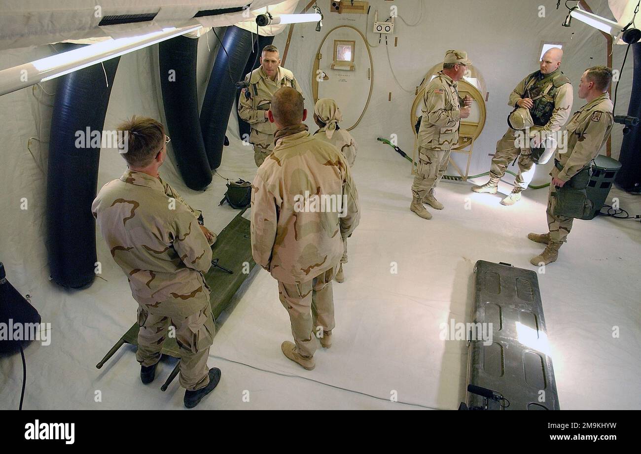 US Navy (USN) Corpsmen and US Marines Corps (USMC) Marines assigned to ...