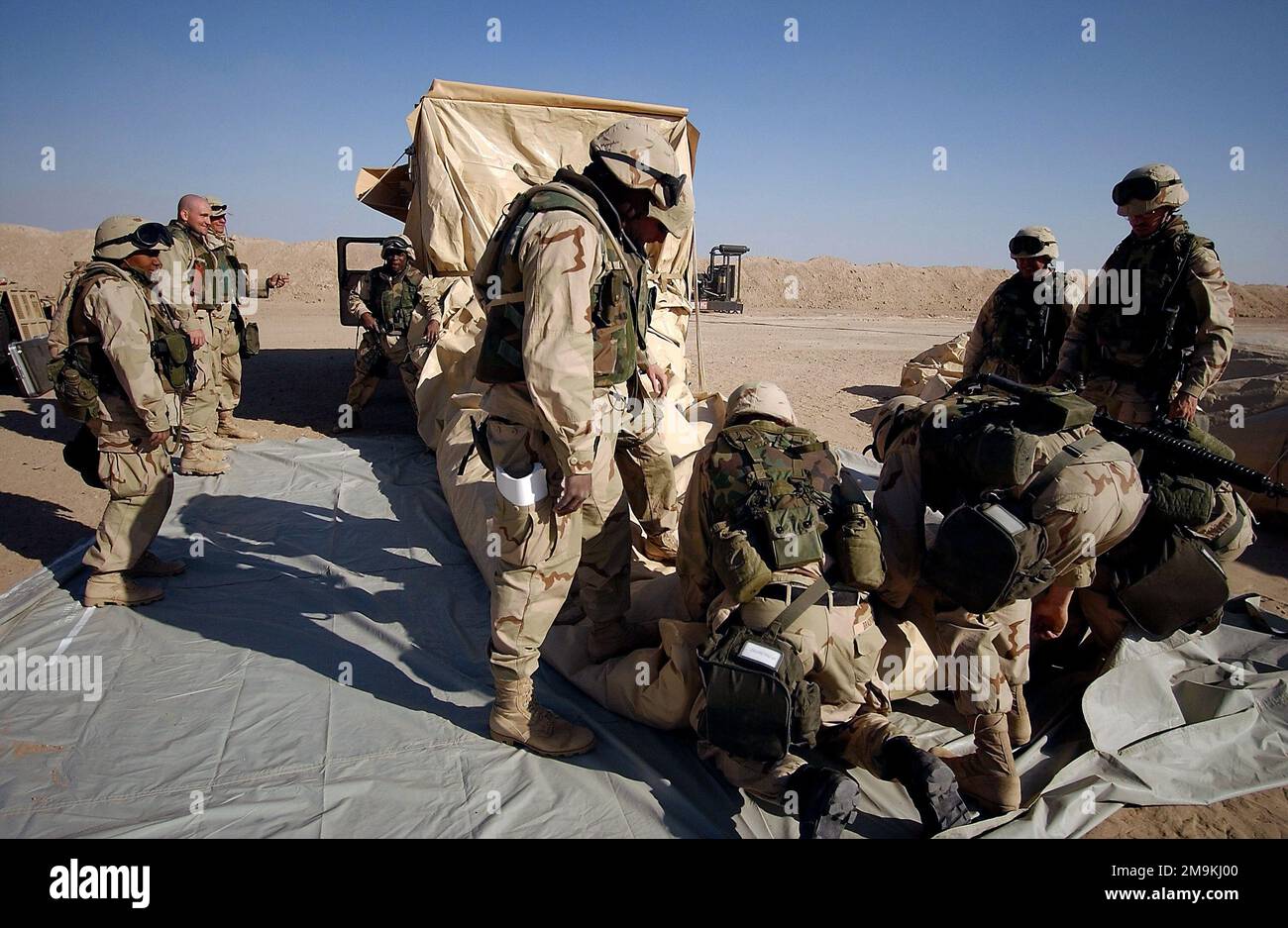 US Navy (USN) Corpsmen and US Marines Corps (USMC) Marines assigned to ...