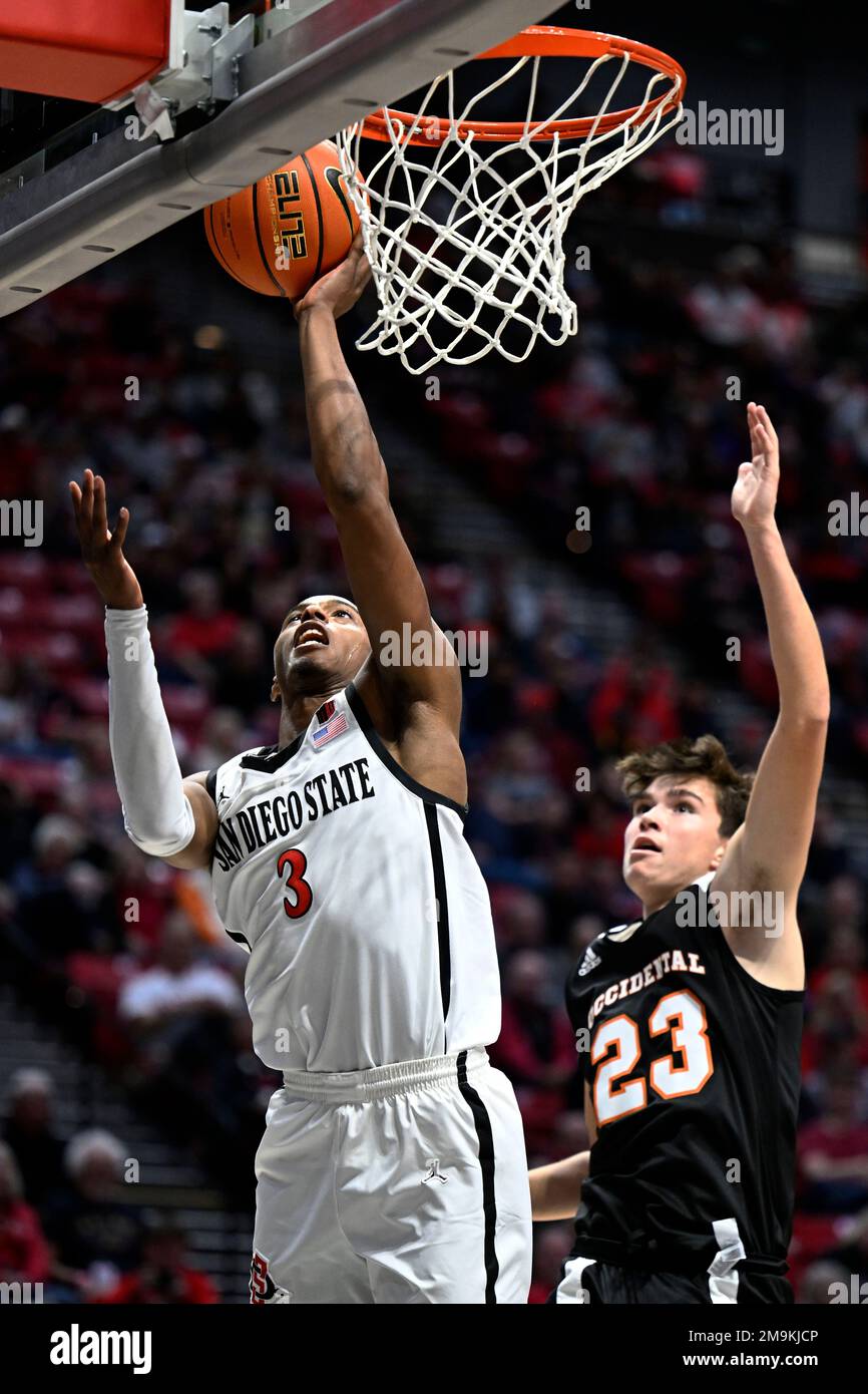 San Diego State guard Micah Parrish (3) shoots past Occidental guard Nicky Clotfelter (23 ...