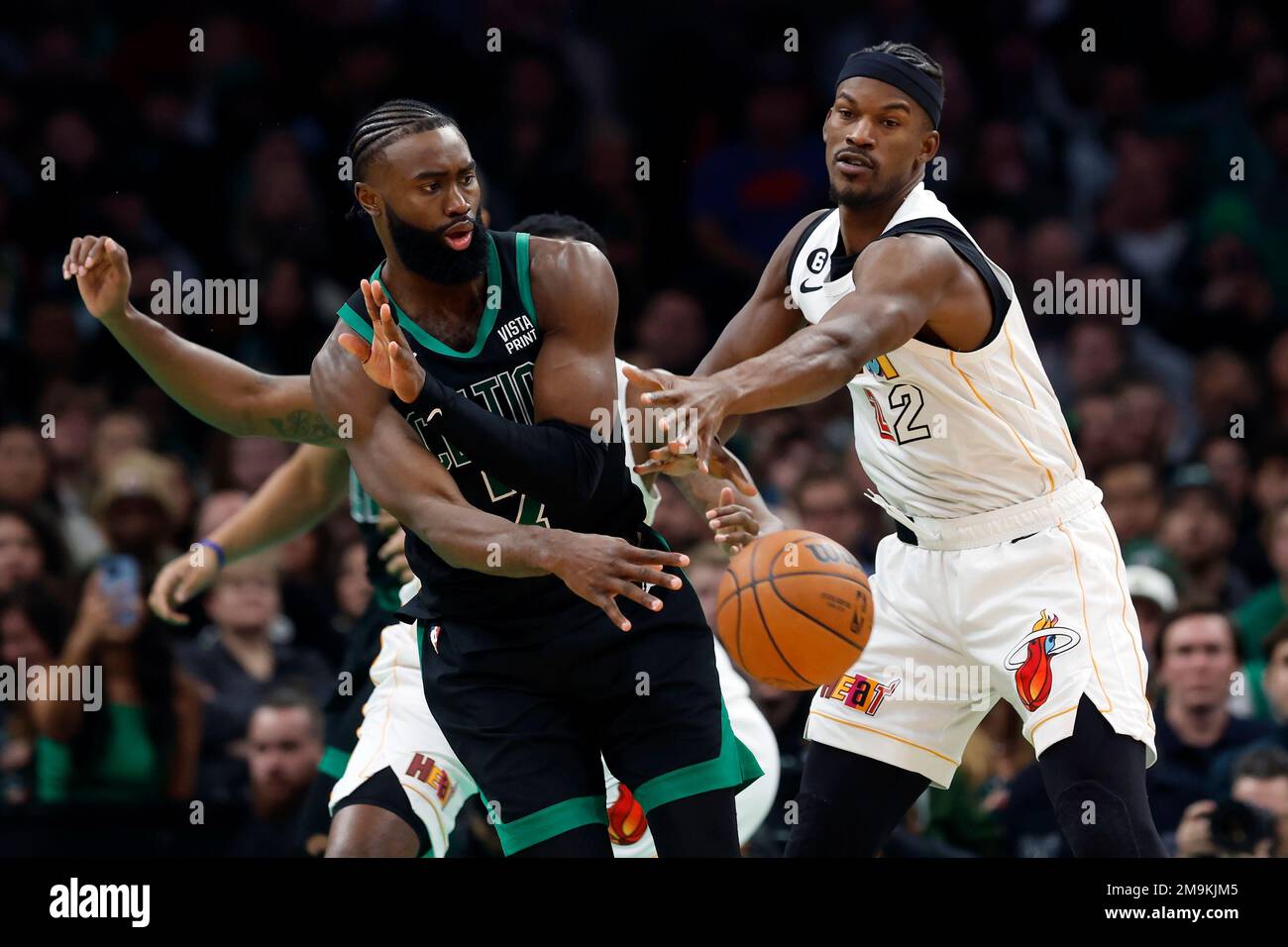 Boston Celtics' Jaylen Brown (7) passes off in front of Miami Heat's ...