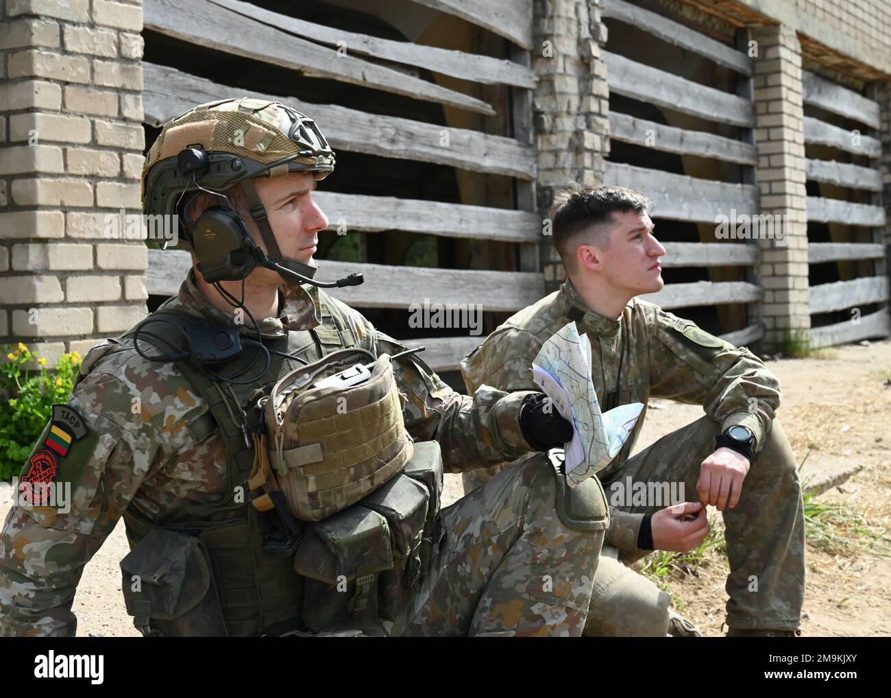 Lithuanian First Lt. Dalius Dulke (left), TACP commanding officer and ...